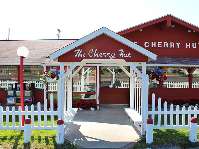 That entrance arbor isn't just an architectural detail&mdash;it's a portal to a world where cherry is king and diet plans go to die.