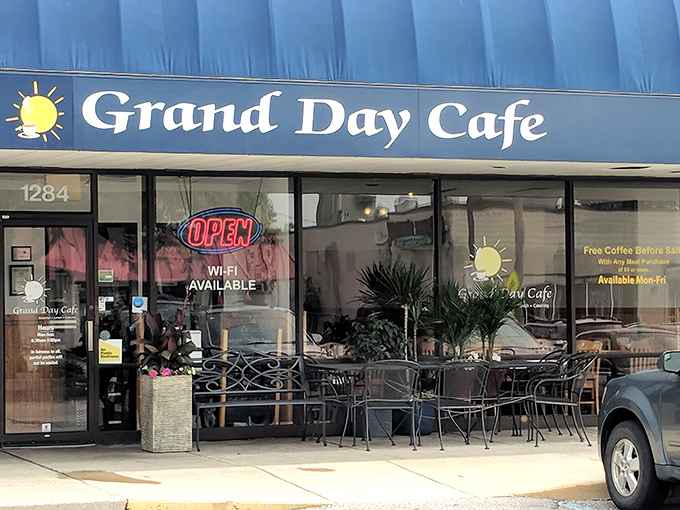 The blue awning of Grand Day Cafe stands out like a beacon of breakfast hope, promising morning salvation to hungry Columbus residents.