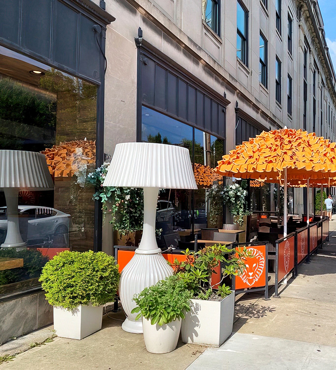 That vibrant orange sign isn't just eye-catching&mdash;it's a beacon of culinary delight in Columbus's Short North district. Food paradise, straight ahead!