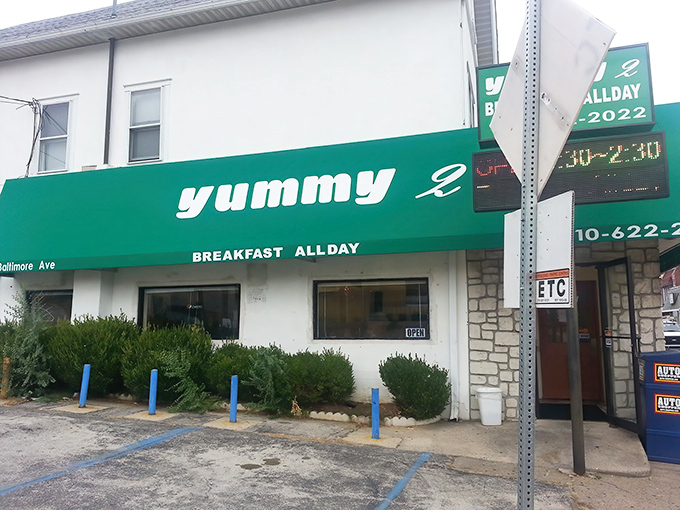 The unmistakable green awning of Yummy 2 promises "BREAKFAST ALLDAY" &ndash; a commitment to morning magic that deserves a standing ovation.