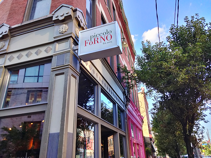 The iconic lettering against historic brick announces your arrival at pizza paradise. Lawrenceville's architectural charm frames this culinary gem perfectly.