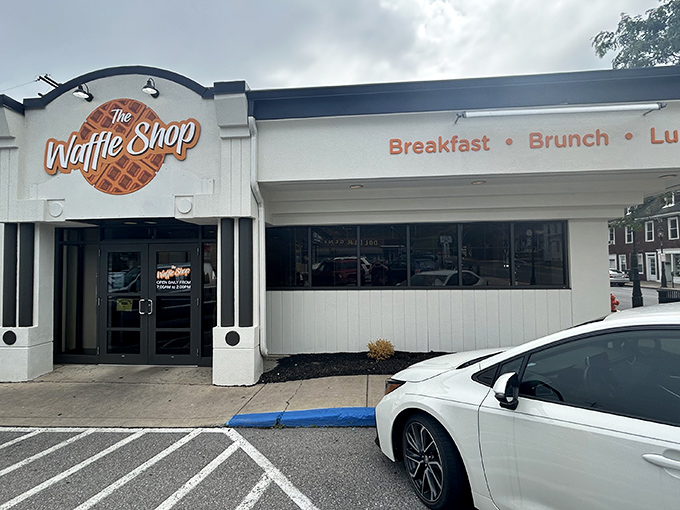 The iconic orange waffle sign beckons like a breakfast lighthouse, guiding hungry souls to this Bellefonte treasure. No fancy frills, just the promise of morning magic.