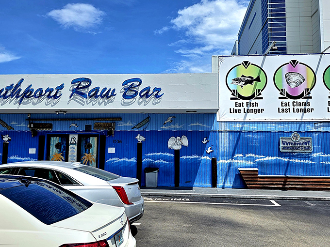 The blue facade of Southport Raw Bar isn't just a building&mdash;it's a promise of seafood salvation waiting inside.