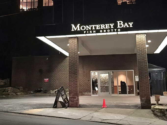 The entrance to seafood paradise glows like a beacon in the night. Monterey Bay Fish Grotto welcomes hungry travelers with the promise of oceanic delights.