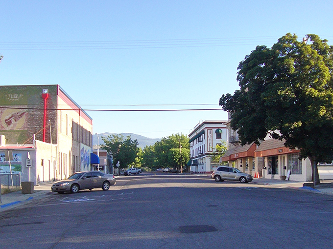 Main Street stretches toward mountain vistas, offering that rare small-town serenity where parking spots outnumber cars and everyone still waves hello.