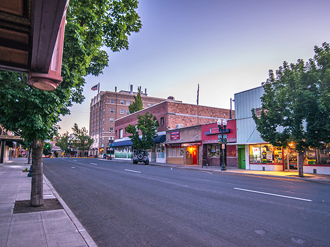 Twilight transforms Main Street into a postcard-perfect scene. Those vintage storefronts aren't putting on airs – they've earned every brick of their character.