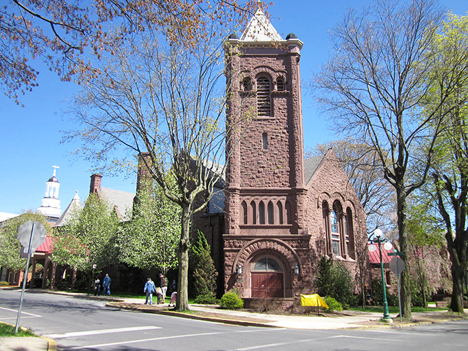 Historic stone churches stand as timeless sentinels in Lewisburg, where architectural heritage meets small-town serenity under clear Pennsylvania skies.