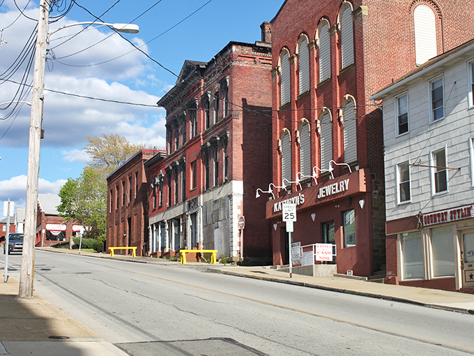 Historic brick buildings line Crawford Avenue, showcasing Connellsville's architectural heritage that whispers stories of its coal and coke boom days.