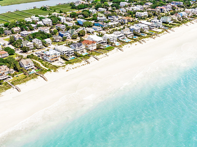 The iconic pier stretches into turquoise waters like nature's welcome mat, inviting you to leave your worries on the mainland.