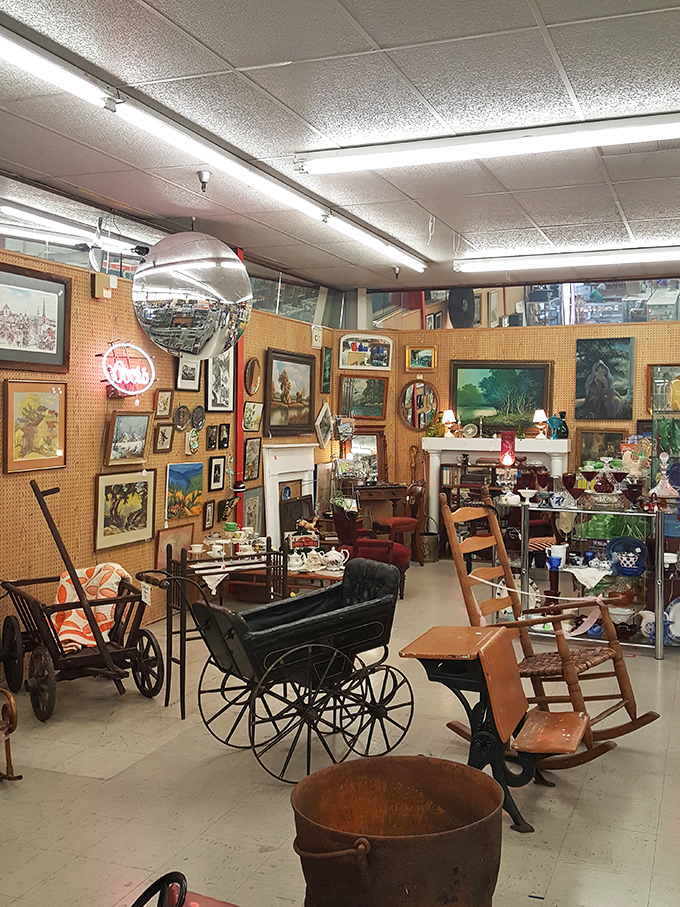 Step inside and you're immediately transported to a wonderland of vintage furniture, including an antique baby carriage that probably has more stories than your great-uncle.