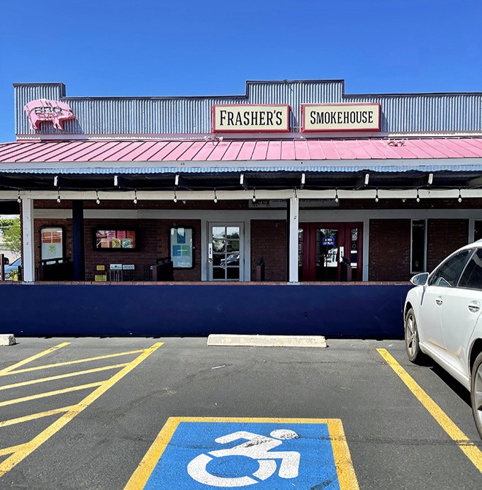 That iconic pink roof and pig sign &ndash; the barbecue equivalent of Batman's signal in the sky, calling hungry Phoenicians to gather.