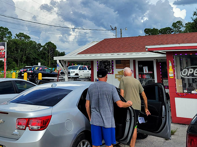 The humble red-roofed exterior that houses BBQ greatness. Like finding a winning lottery ticket in your jeans pocket - unassuming but life-changing.