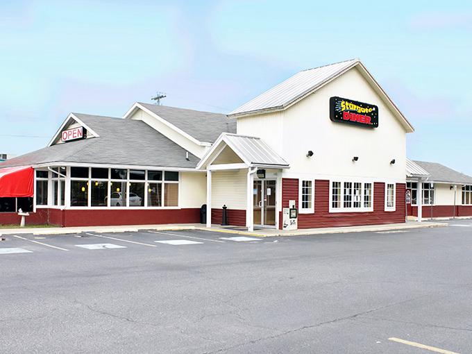 The classic red and white exterior of Stargate Diner stands like a beacon of comfort food hope along Seaford's roadside, promising delicious adventures within.