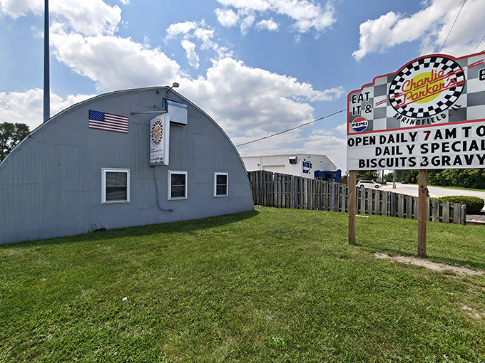 The unmistakable Quonset hut silhouette of Charlie Parker's stands like a breakfast beacon against the Illinois sky, promising comfort food salvation to hungry travelers.