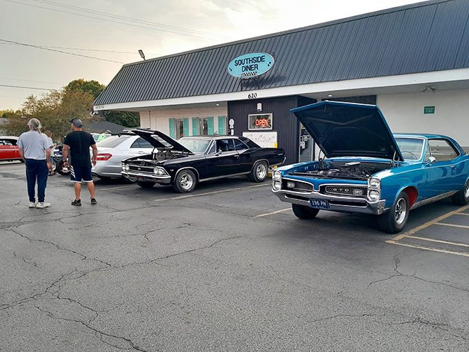 Classic cars and a blue sign welcome you to Southside Diner, where automotive nostalgia meets breakfast perfection in Mt. Vernon's hidden gem.