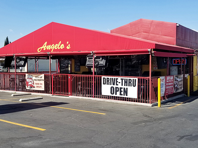 That iconic red awning isn't just a roof – it's a beacon of burger bliss that's been calling hungry Anaheim locals for generations.