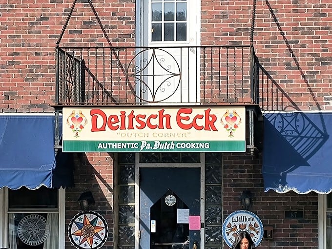 The brick facade of Deitsch Eck welcomes hungry travelers with its vibrant sign promising authentic Pennsylvania Dutch cooking&mdash;a culinary time machine disguised as a restaurant.