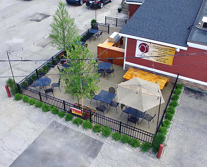 The bright red exterior of O's Pub & Grill stands out in Auburn like a culinary lighthouse guiding hungry travelers to burger paradise.