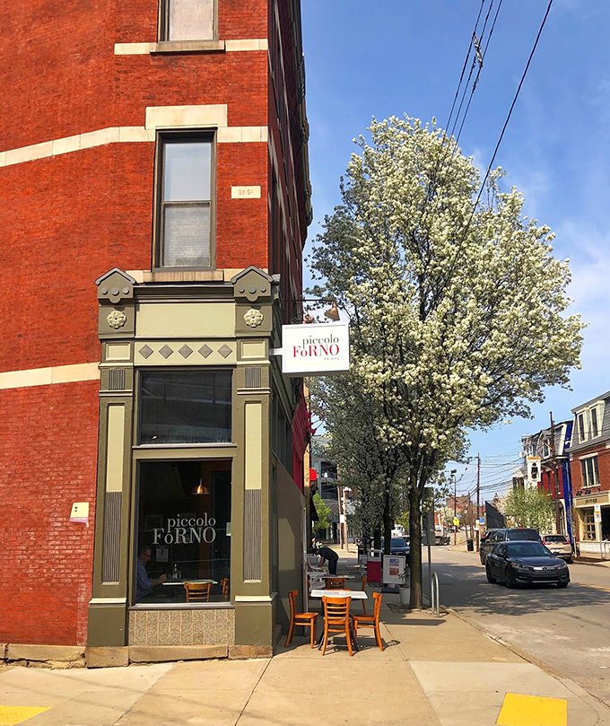 The iconic lettering against historic brick announces your arrival at pizza paradise. Lawrenceville's architectural charm frames this culinary gem perfectly.