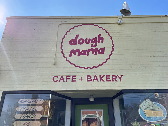 The cheerful burgundy logo against crisp white brick promises comfort before you even step inside. Breakfast, coffee, lunch, pie &ndash; all the food groups represented!