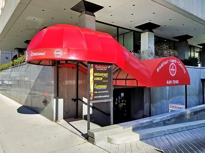 That iconic red awning stands out like a culinary lighthouse amid downtown Columbus's concrete jungle, beckoning hungry office workers to sandwich salvation.