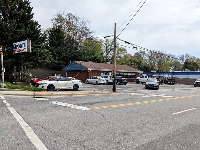 A bird's-eye view of Five Points Restaurant, where cars fill the parking lot like hungry patrons fill their bellies—completely and without hesitation.