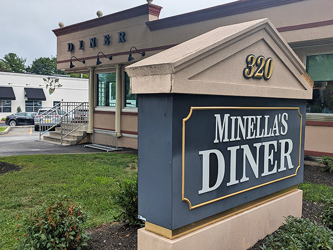 Minella's iconic sign stands as a beacon of breakfast hope on Lancaster Avenue, promising comfort food that's worth every calorie.