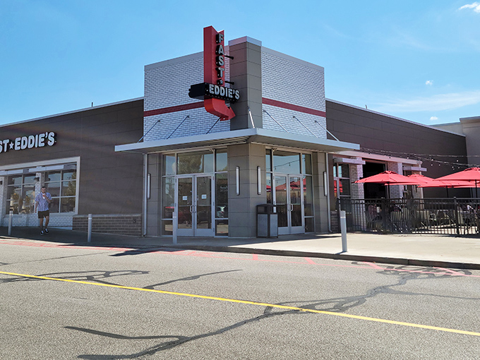 The retro-modern signage beckons like a lighthouse for the burger-obsessed. Fast Eddie's exterior promises what the interior delivers&mdash;comfort with contemporary flair.