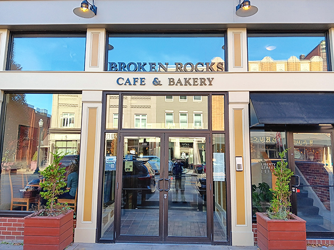 The welcoming façade of Broken Rocks beckons like an old friend with a new secret. Those potted plants aren't just decoration—they're your first clue that someone here sweats the small stuff.