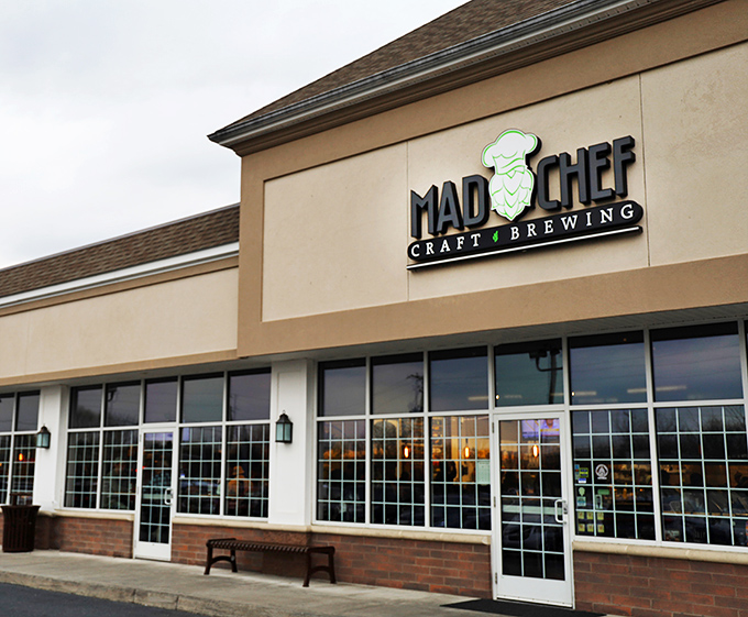 The unassuming storefront of Mad Chef Craft Brewing hides culinary treasures within, like finding a secret level in your favorite video game.