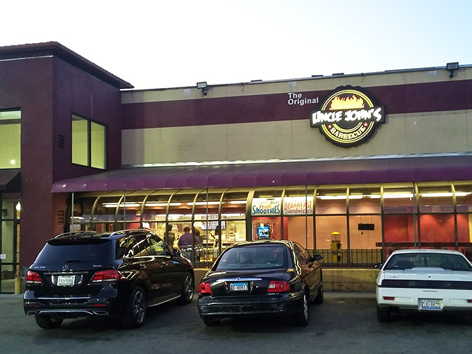 The unassuming storefront of Uncle John's BBQ stands like a beacon for smoke-seekers, its modest exterior hiding Chicago's barbecue royalty within.