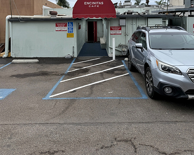 The unassuming exterior of Encinitas Cafe proves once again that culinary treasures often hide behind modest facades. That burgundy awning beckons like a secret handshake.