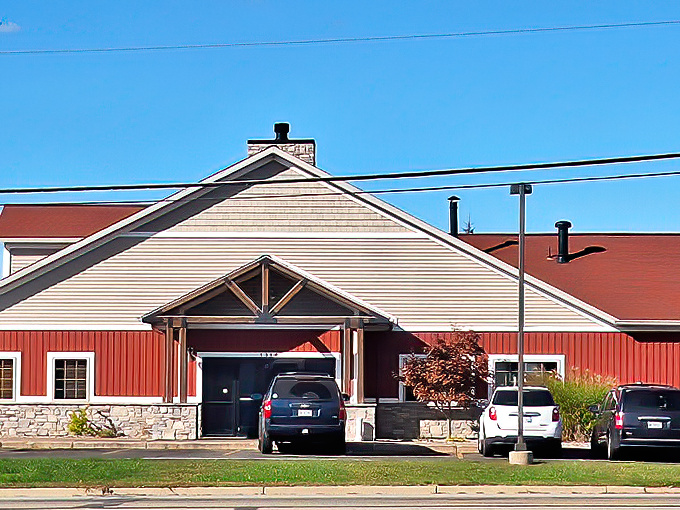 The barn-red exterior of Hop Hog isn't just eye-catching&mdash;it's a beacon for barbecue pilgrims seeking smoky salvation in Greenville's countryside.