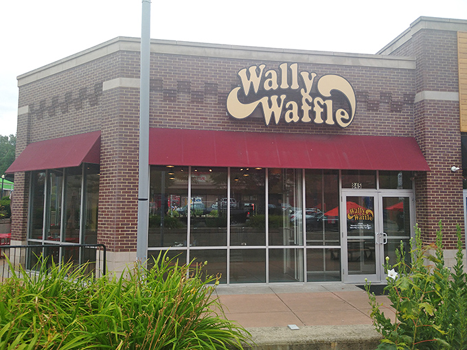 The iconic red awnings and retro signage of Wally Waffle stand as a beacon of breakfast hope for hungry Akronites.