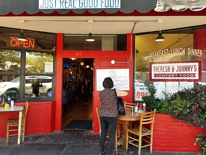 The lime green exterior with its charming white picket fence isn't just inviting&mdash;it's practically daring you not to smile as you approach.