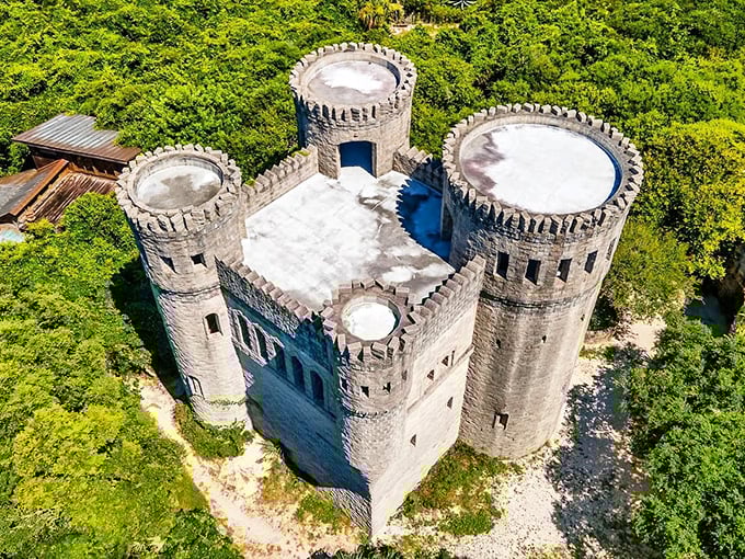 From above, Castle Otttis resembles a medieval chess piece dropped into Florida's lush landscape&mdash;a stone sentinel guarding secrets beneath its weathered towers.