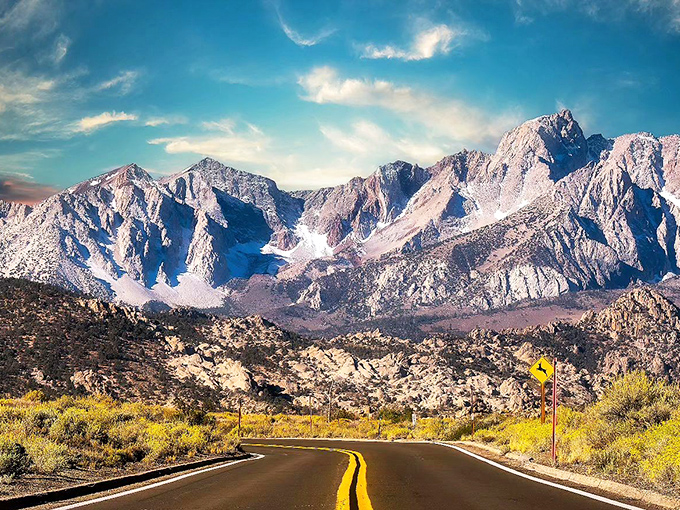 Mother Nature's golden hour masterpiece along the Alabama Hills, where every drive feels like you're starring in your own epic Western.