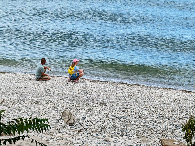 The same scene appears again, showing visitors enjoying the peaceful shoreline where time slows down and worries wash away with each lapping wave.