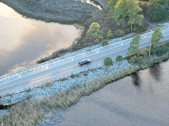 Where the emerald meets the ivory: Scenic Highway 30A stretches like a ribbon between the Gulf's impossible blue-green waters and Florida's pristine white beaches.