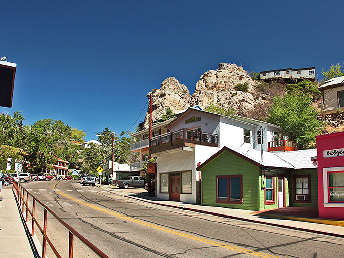 Bisbee defies gravity with homes clinging to hillsides like colorful barnacles. This vertical village proves that Arizona has more architectural surprises than just adobe and cactus.