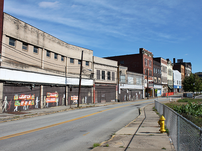 Main Street's storefronts tell silent stories of boom years past, their vintage facades a poignant reminder of small-town America's changing fortunes.