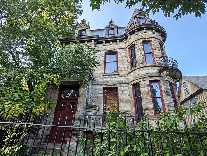 Franklin Castle stands like a Victorian-era haunted house casting call winner, complete with turrets, gargoyles, and an aura that whispers, "Enter if you dare."