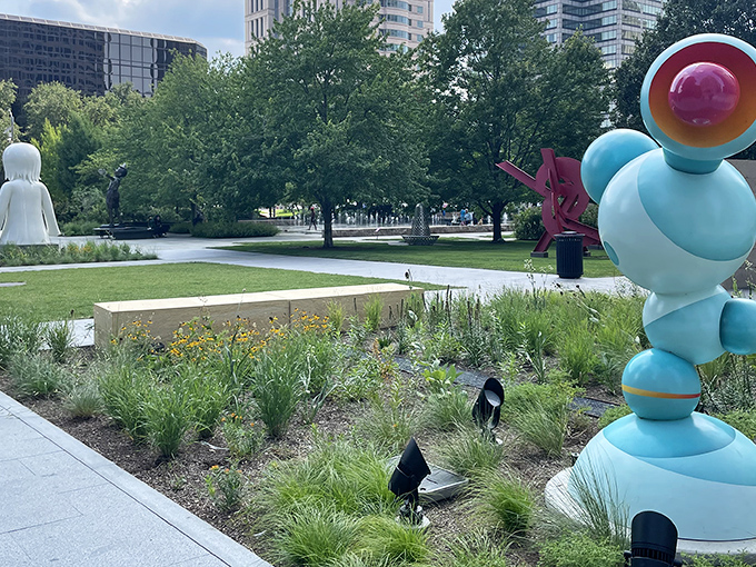 Where concrete jungle meets artistic playground: Citygarden's colorful sculptures create a surreal oasis amid downtown St. Louis's skyscrapers.