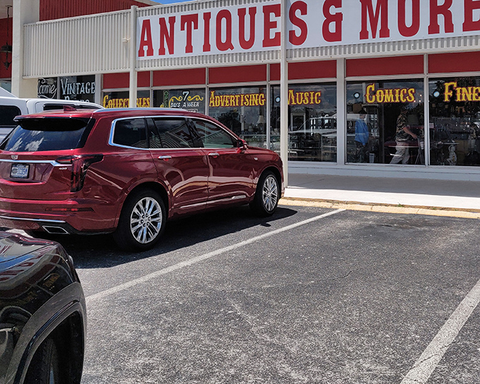 The bold red signage of Wildwood Antique Mall promises treasures within, like a vintage Vegas marquee advertising the jackpot of nostalgia inside.