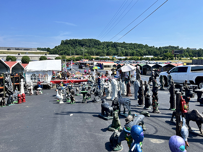 Garden statues stand sentinel in the parking lot, promising treasures beyond your wildest yard sale dreams.
