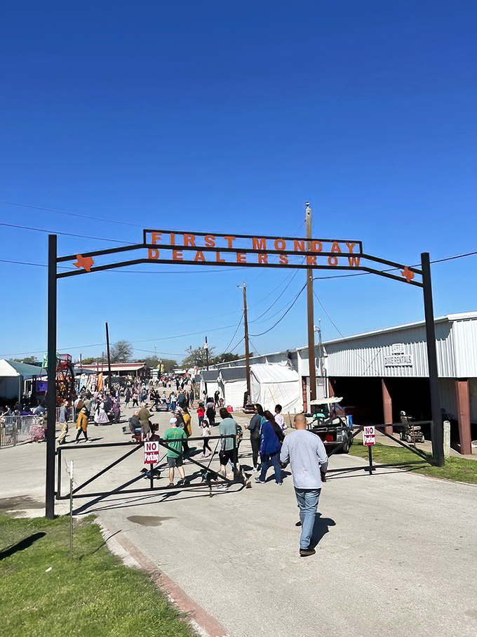 The iconic "First Monday Dealers Row" entrance arch &ndash; like a portal to a parallel universe where bargains and curiosities await.
