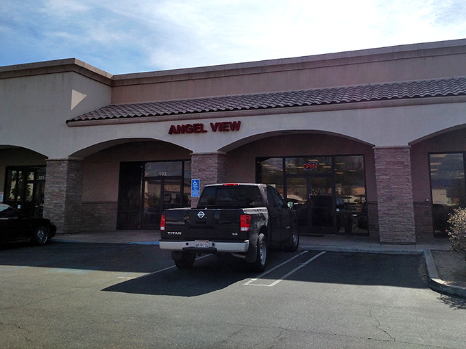 The desert sun casts long shadows across Angel View's unassuming facade, where behind these neutral walls lies a treasure hunter's paradise waiting to be explored.