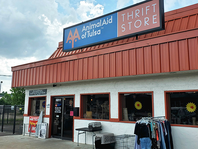 The distinctive red-roofed building stands out like a beacon for bargain hunters. Inside this unassuming exterior lies a treasure trove of second-hand wonders.