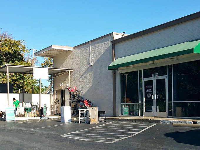 The unassuming exterior hides a treasure trove within. Like finding a secret speakeasy, but instead of cocktails, you'll discover vintage furniture bargains.