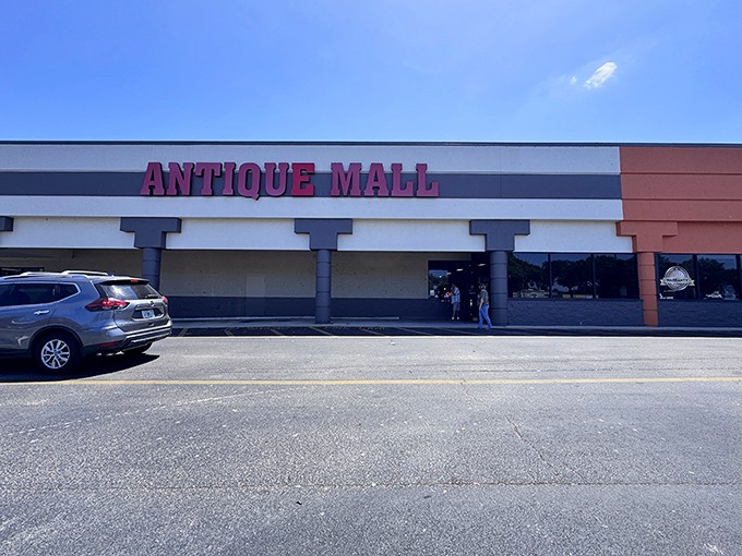 The Lakeland Antique Mall beckons with its bold red signage, promising treasures inside that won't break the bank. Florida's vintage paradise awaits!